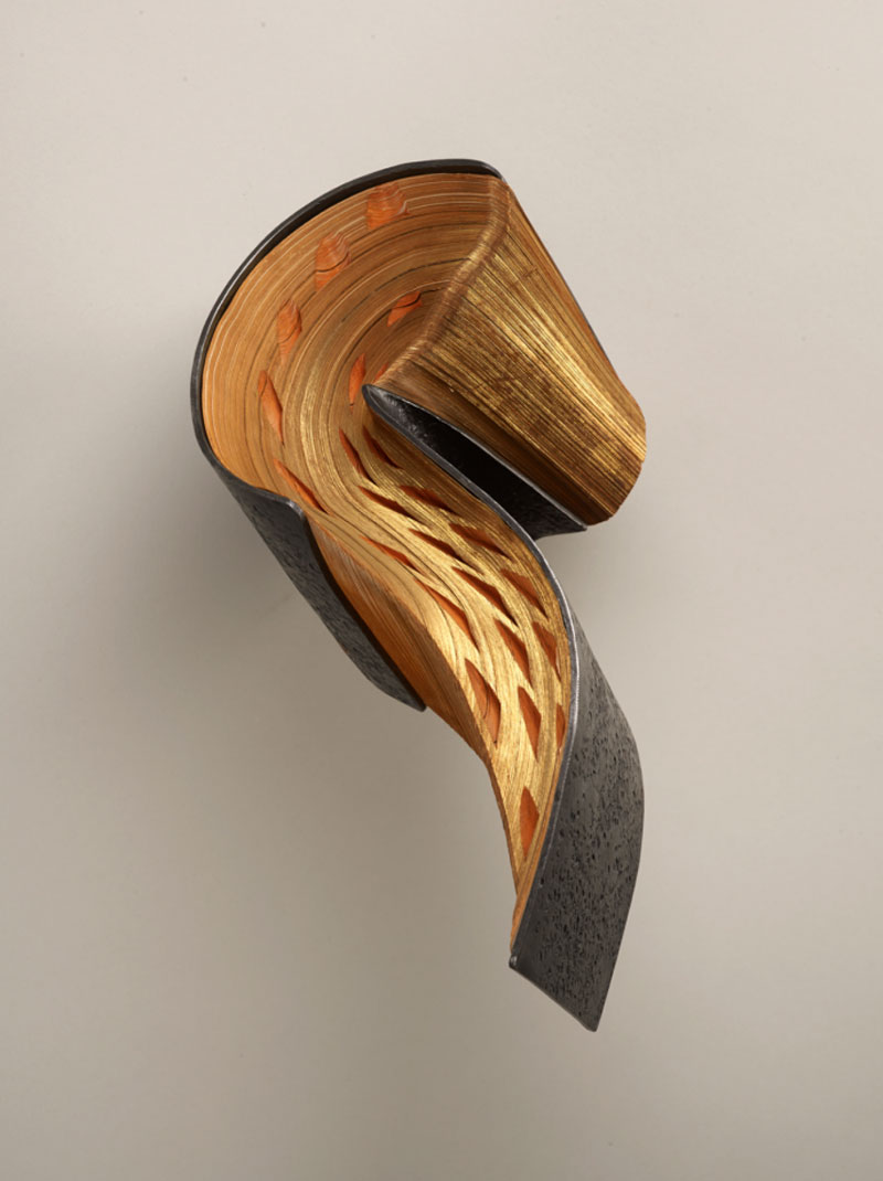 Stunning book sculptures shaped with metal