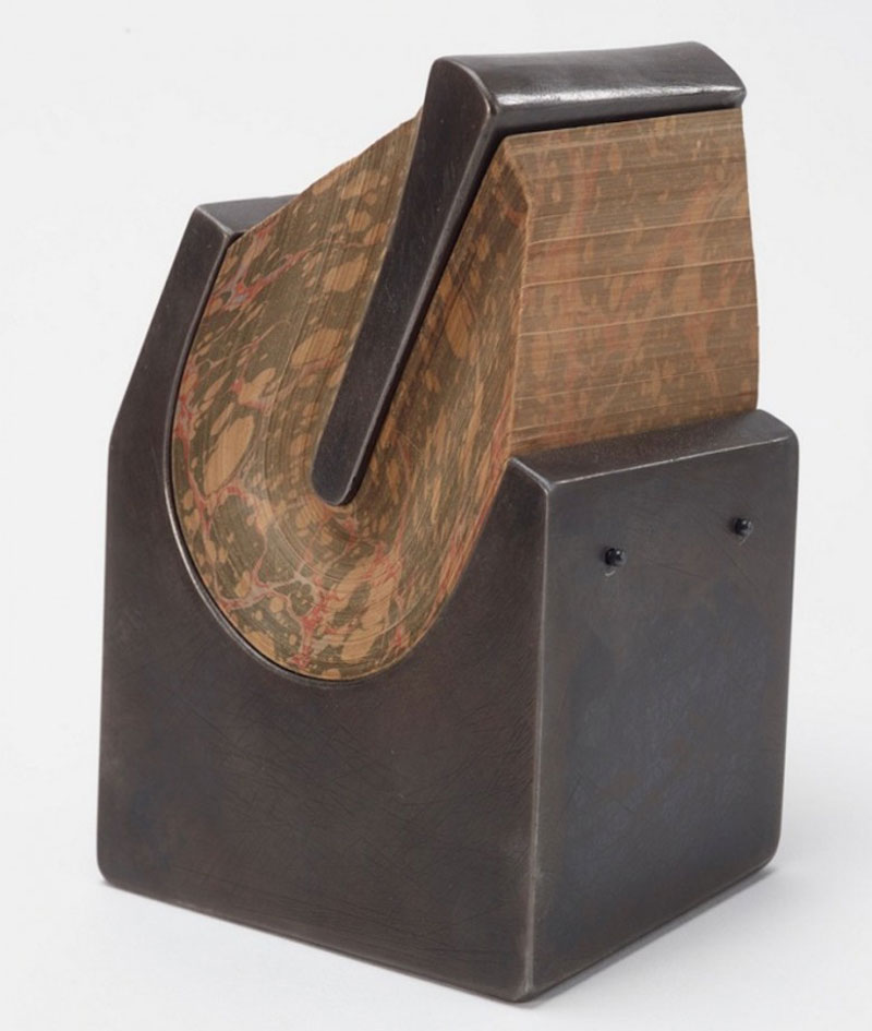 Stunning book sculptures shaped with metal