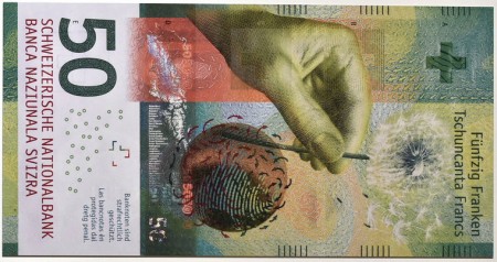 The Swiss National Bank unveils a new 50 francs bill